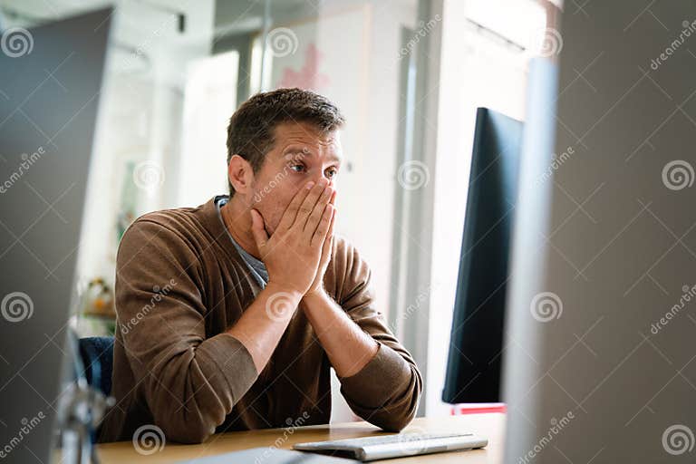 Portrait of a Disappointed Man Programmer Looking Stressed Out while ...