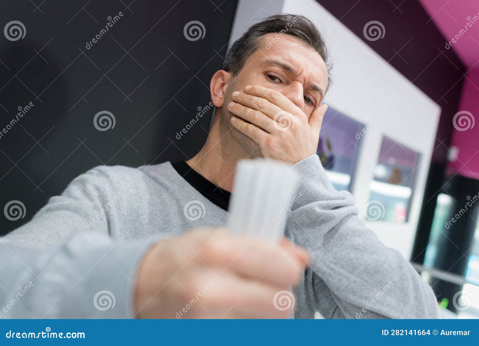 Portrait Of A Disgusted Business Man Isolated On Gray Wall Background ...