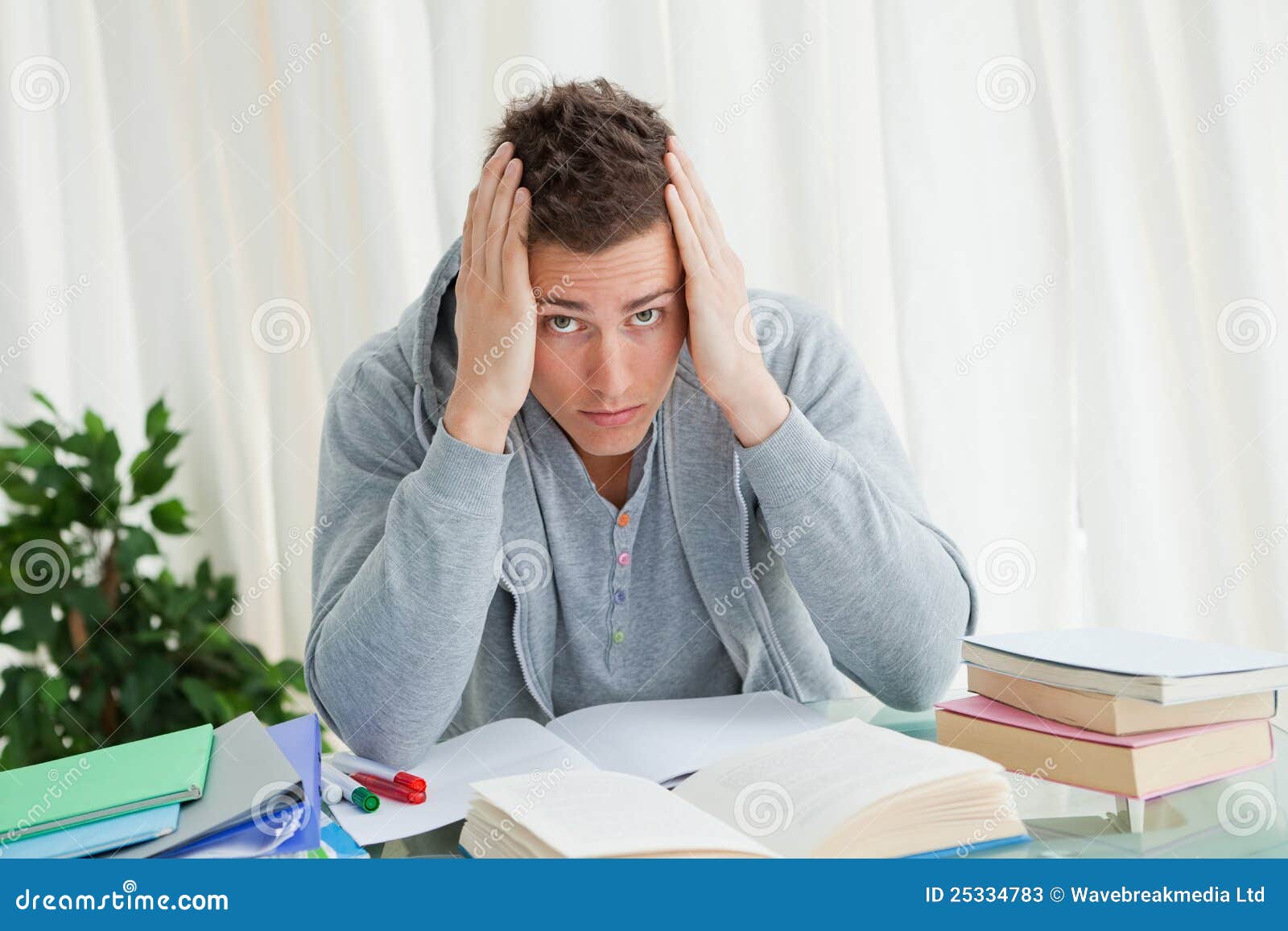 Portrait of a Distressed Student Doing His Homeworks Stock Image ...