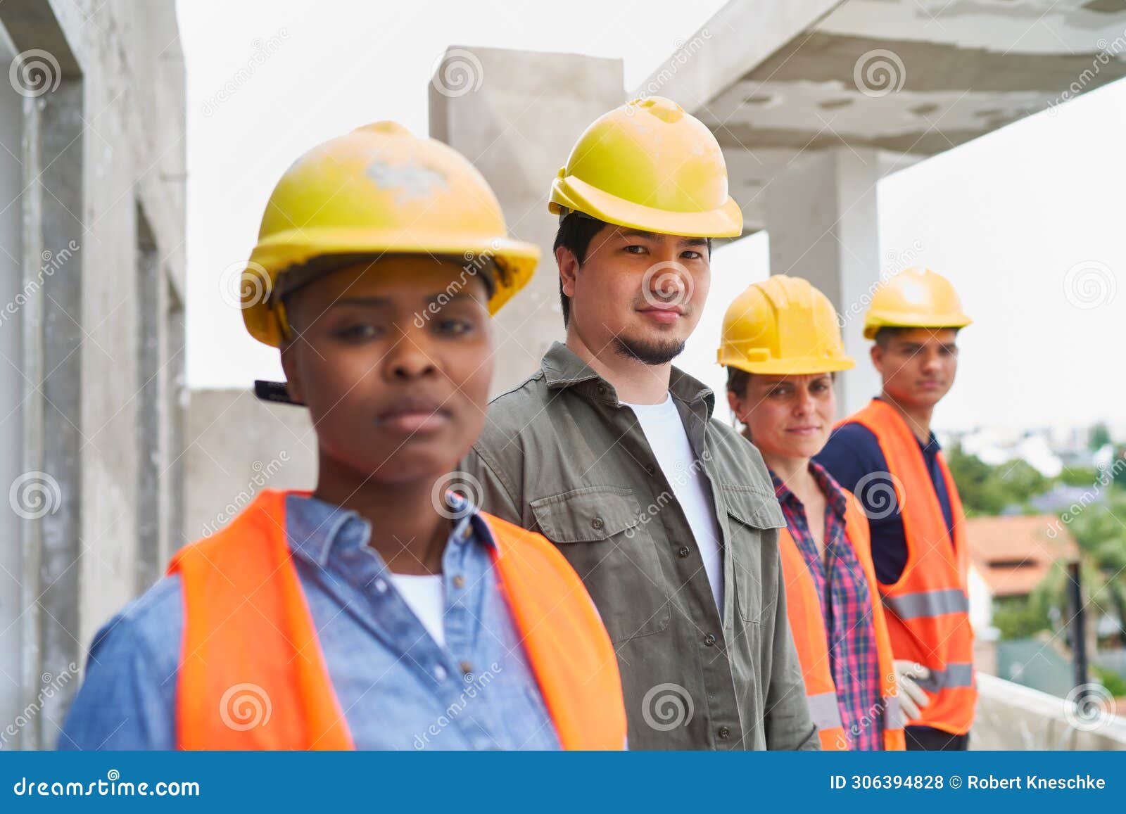 Portrait of Diverse Construction Team in Workwear Standing Together at ...
