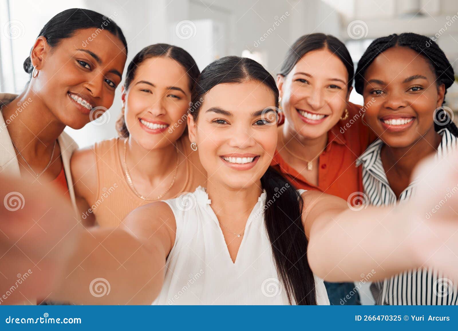 Portrait Of A Diverse Group Of Five Happy Businesswomen Taking A Selfie