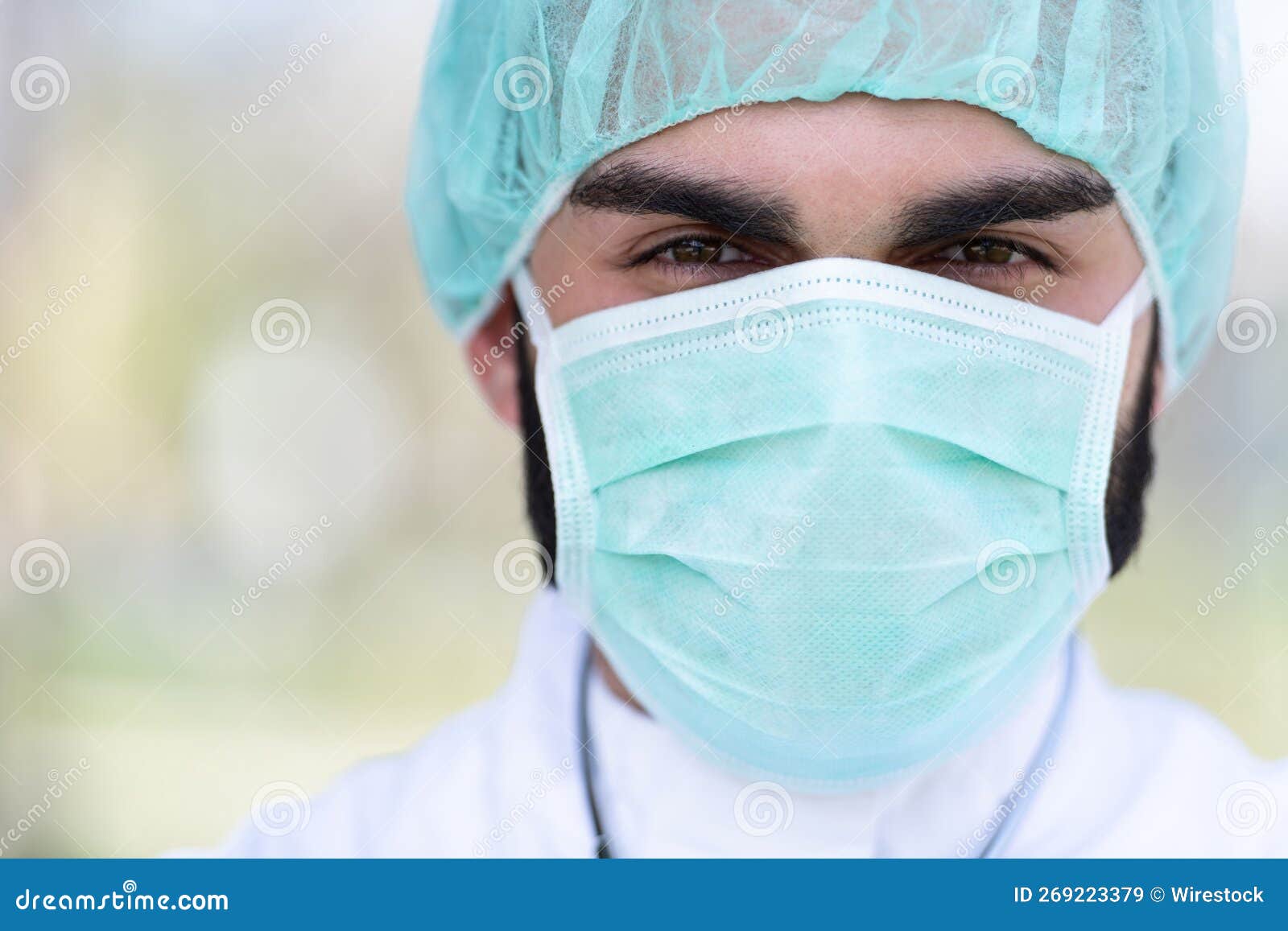 Portrait of a Doctor with a Facemask Covering His Face Stock Image ...