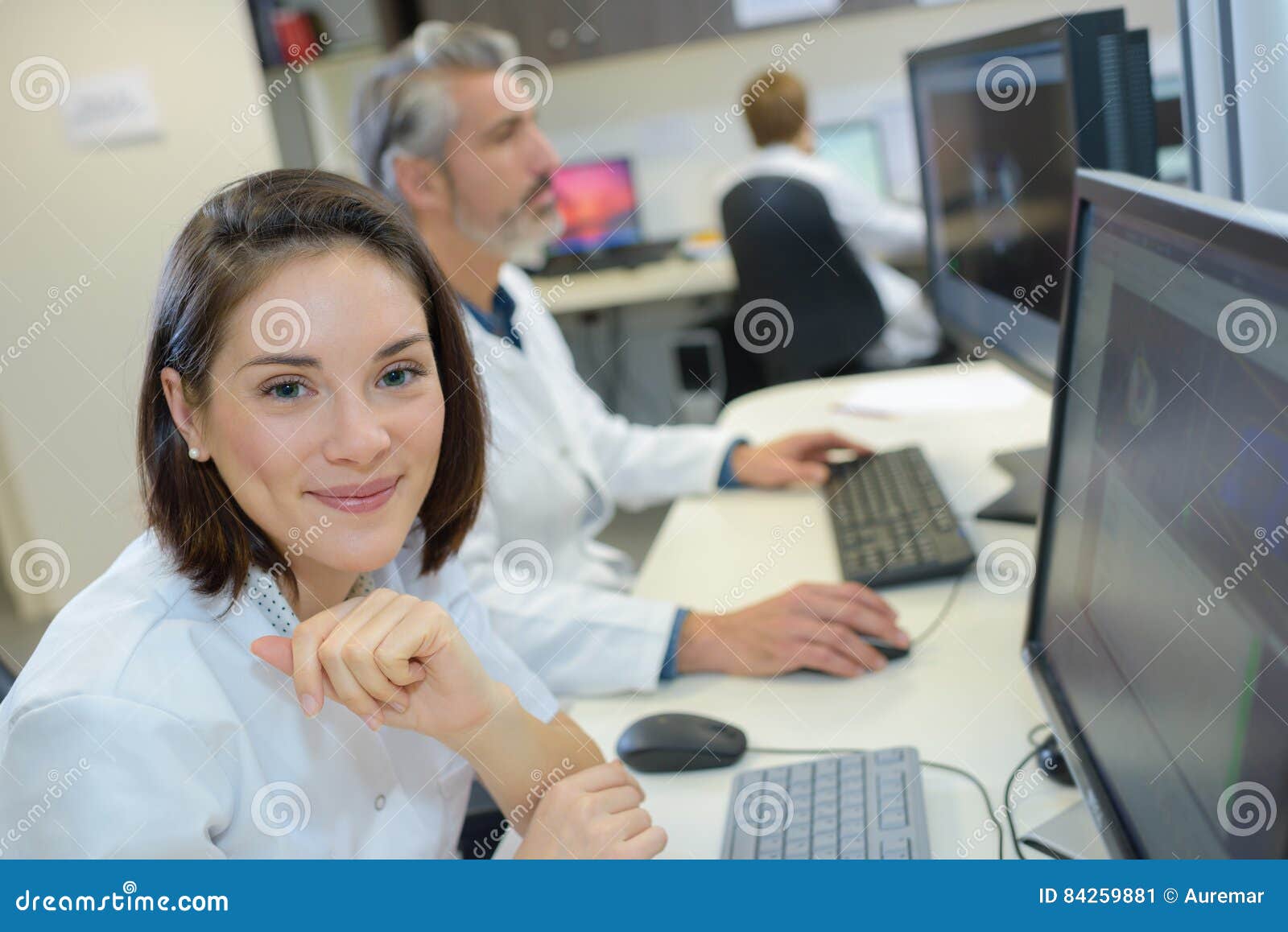 Portrait Doctor Looking at Scans on Computer Stock Image - Image of ...