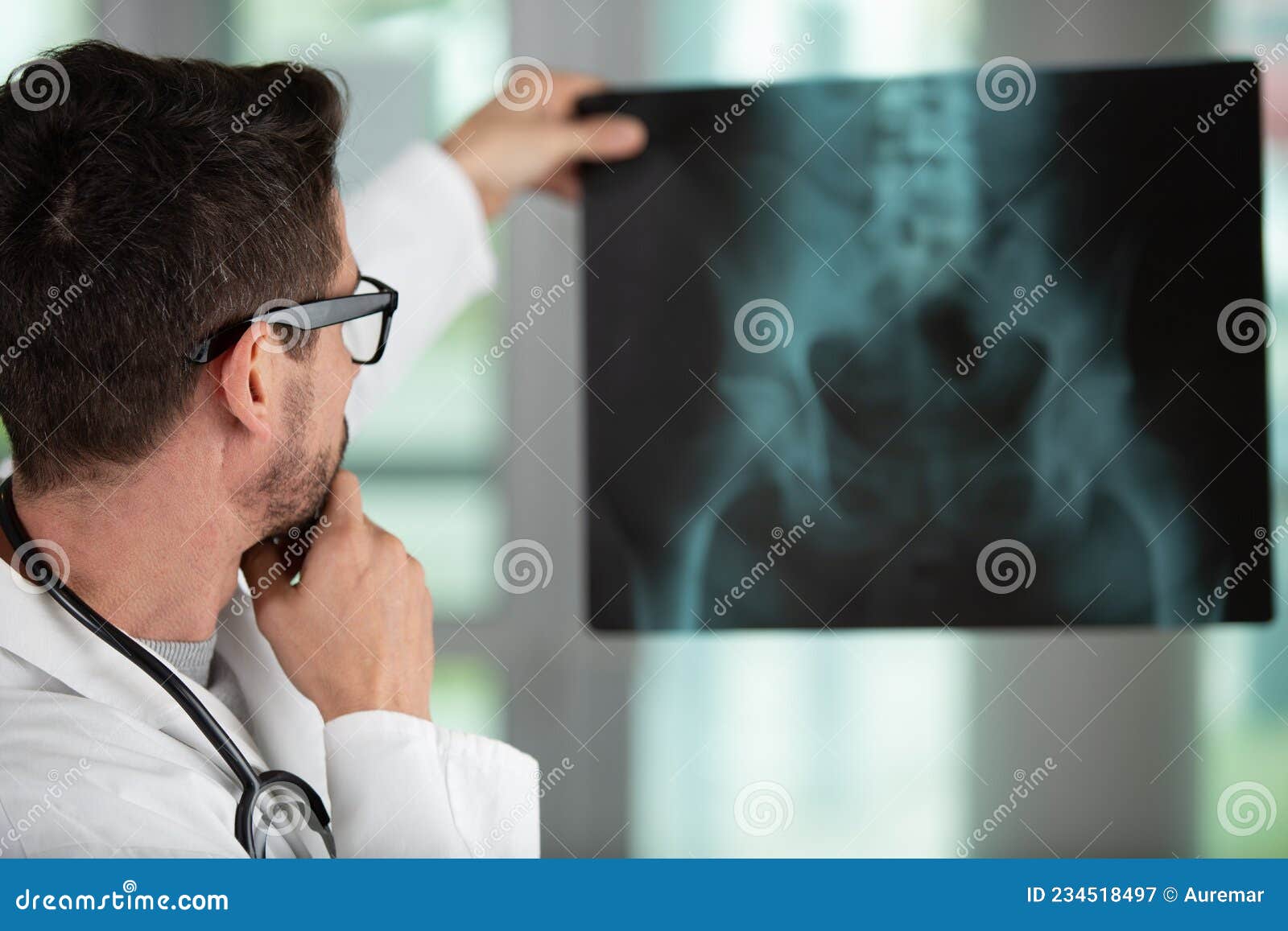 Portrait Doctor in White Lab Coat Looking at Radiography Stock Image ...