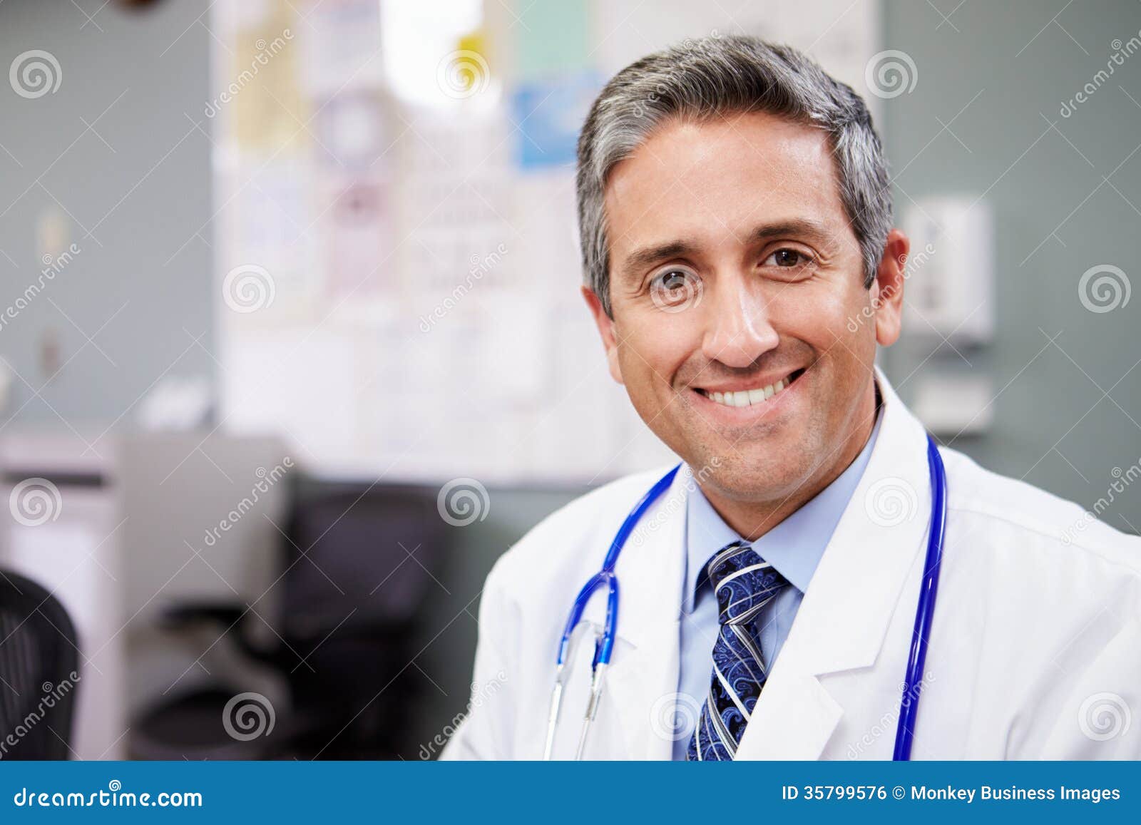Portrait of Doctor Working at Nurses Station Stock Photo - Image of ...