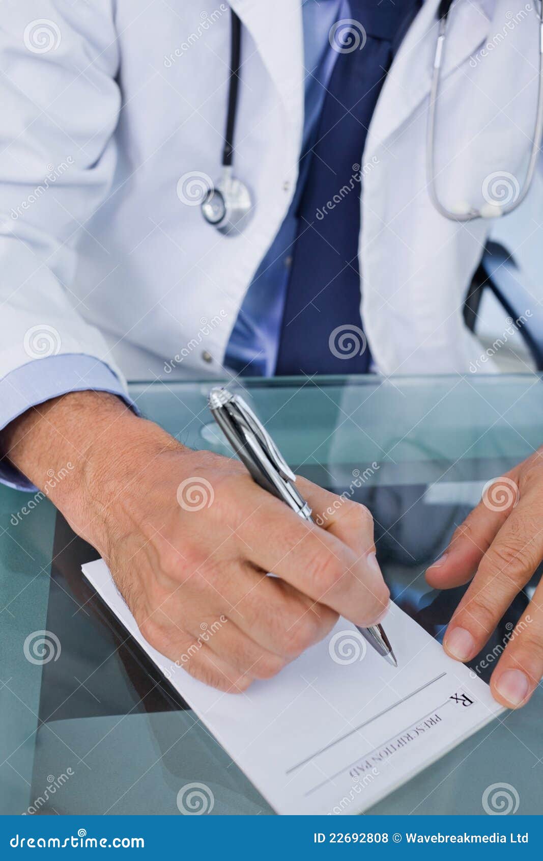 Portrait of a Doctor Writing a Prescription Stock Photo - Image of ...