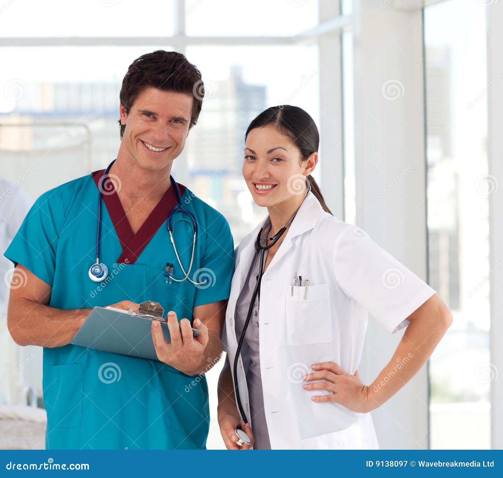 Portrait of Doctors in a Hospital Looking Happy Stock Image - Image of ...