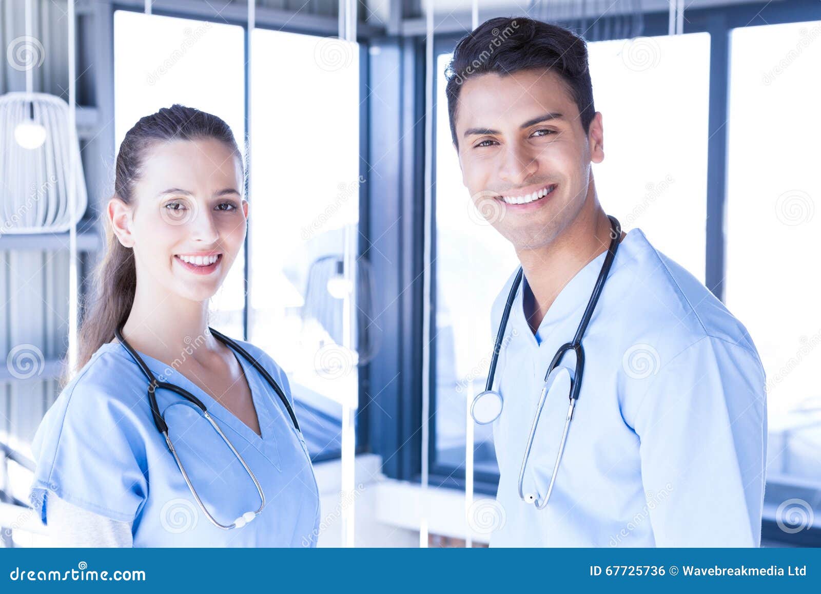 Portrait of Doctors Smiling at Camera Stock Photo - Image of happy ...