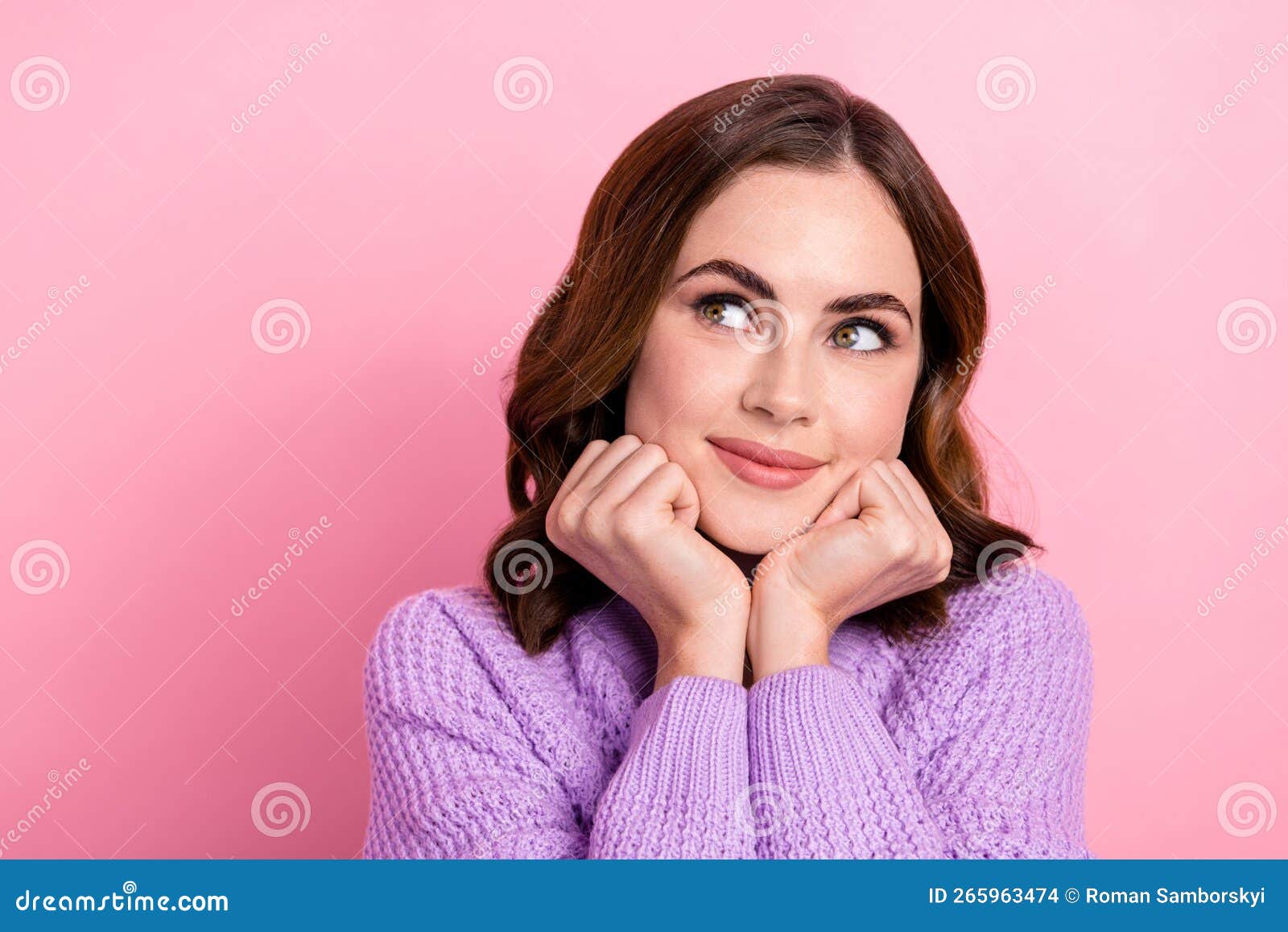 Portrait Of Dreamy Satisfied Optimistic Girl With Curly Hairdo Dressed