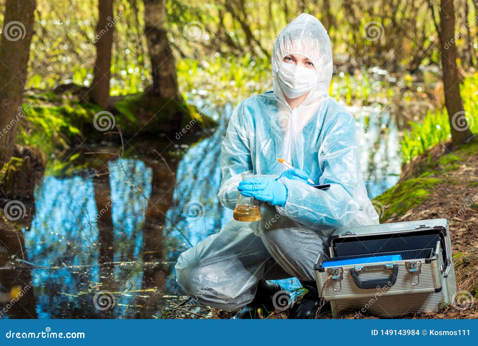 Portrait of an Ecologist in Protective Clothing while Working, Taking ...