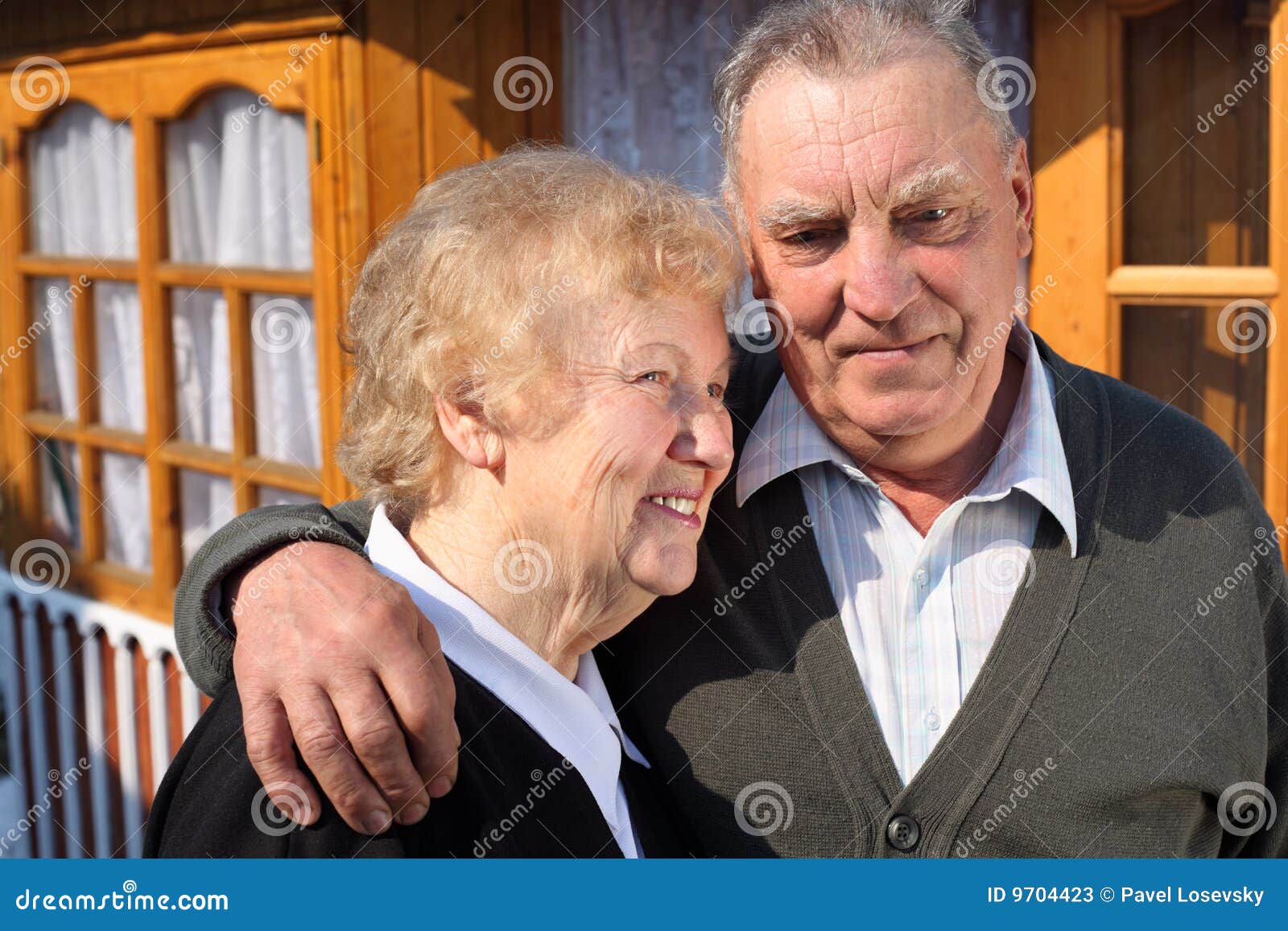 Portrait of elderly couple stock image. Image of house - 9704423