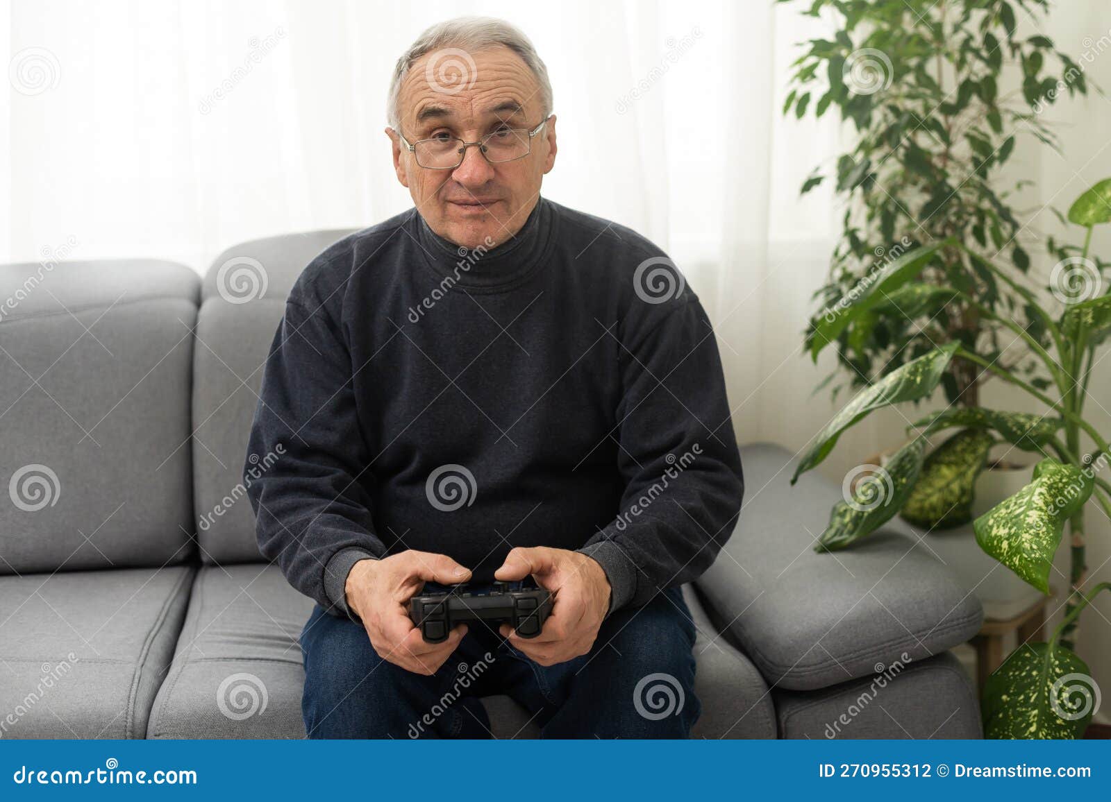 Portrait of Elderly Man Playing Video Games Stock Photo - Image of ...