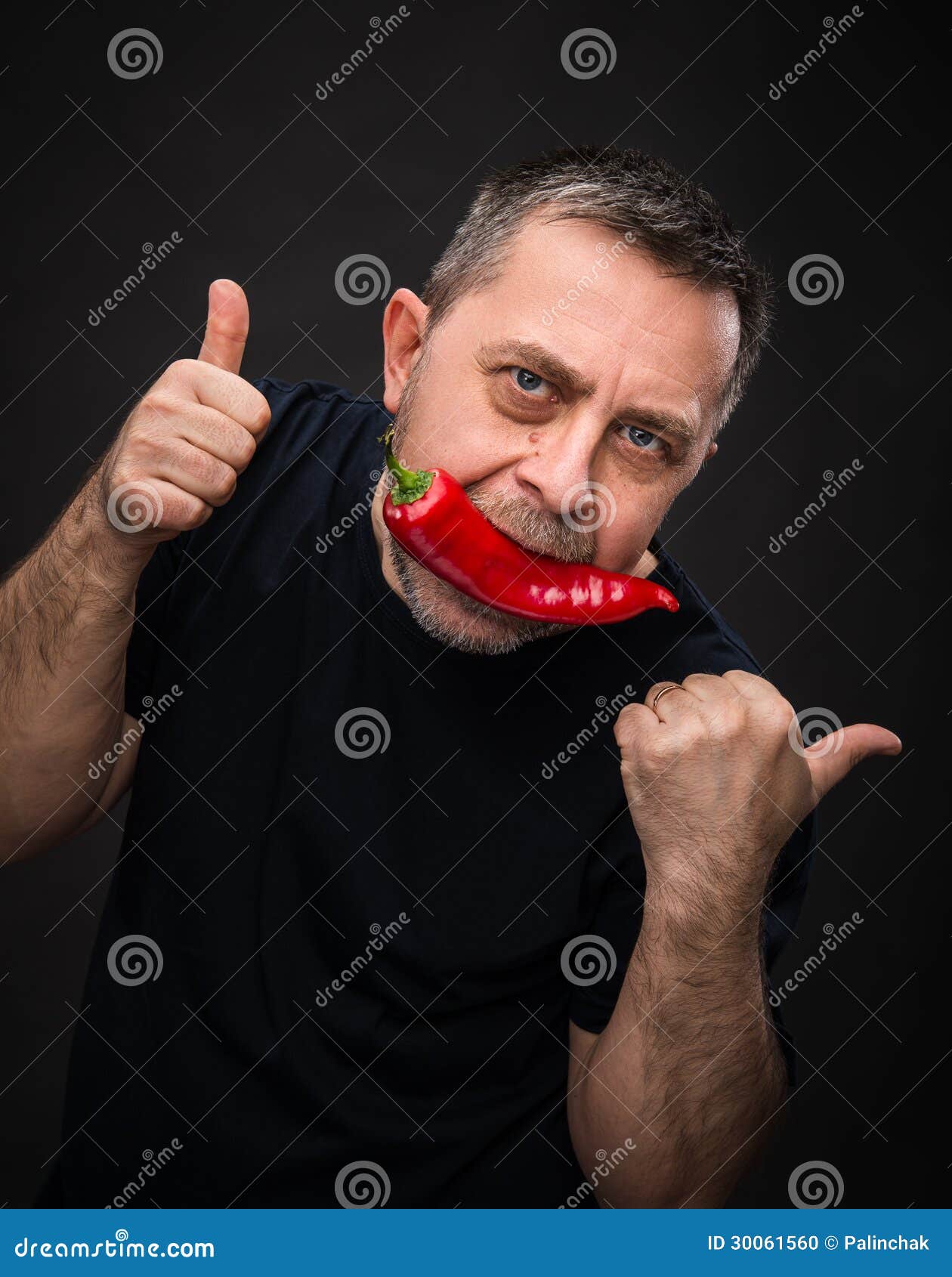 Elderly Man with Red Pepper in His Mouth Stock Photo - Image of ...