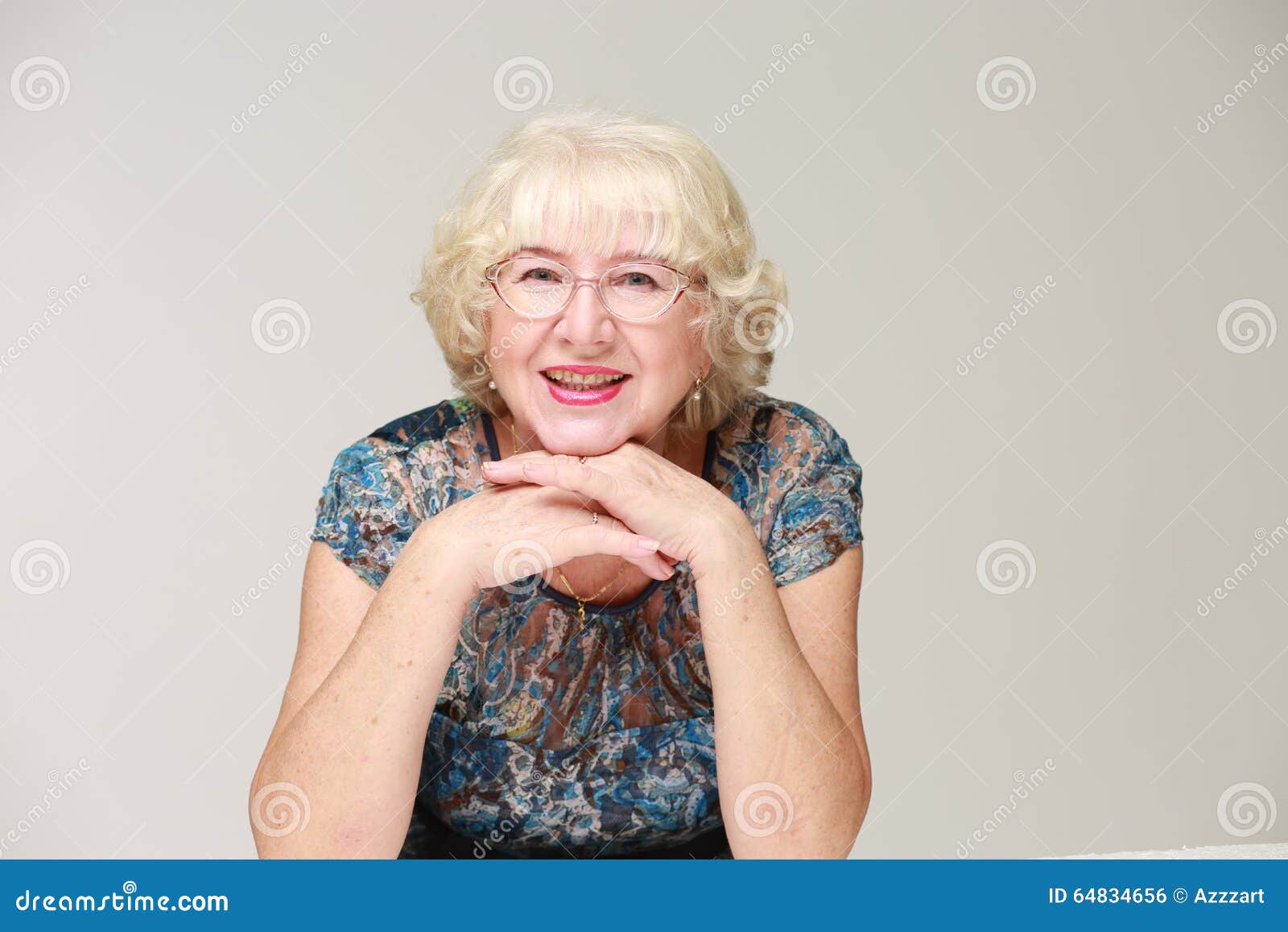 Portrait of an Elderly Smiling Woman Stock Photo - Image of studio ...