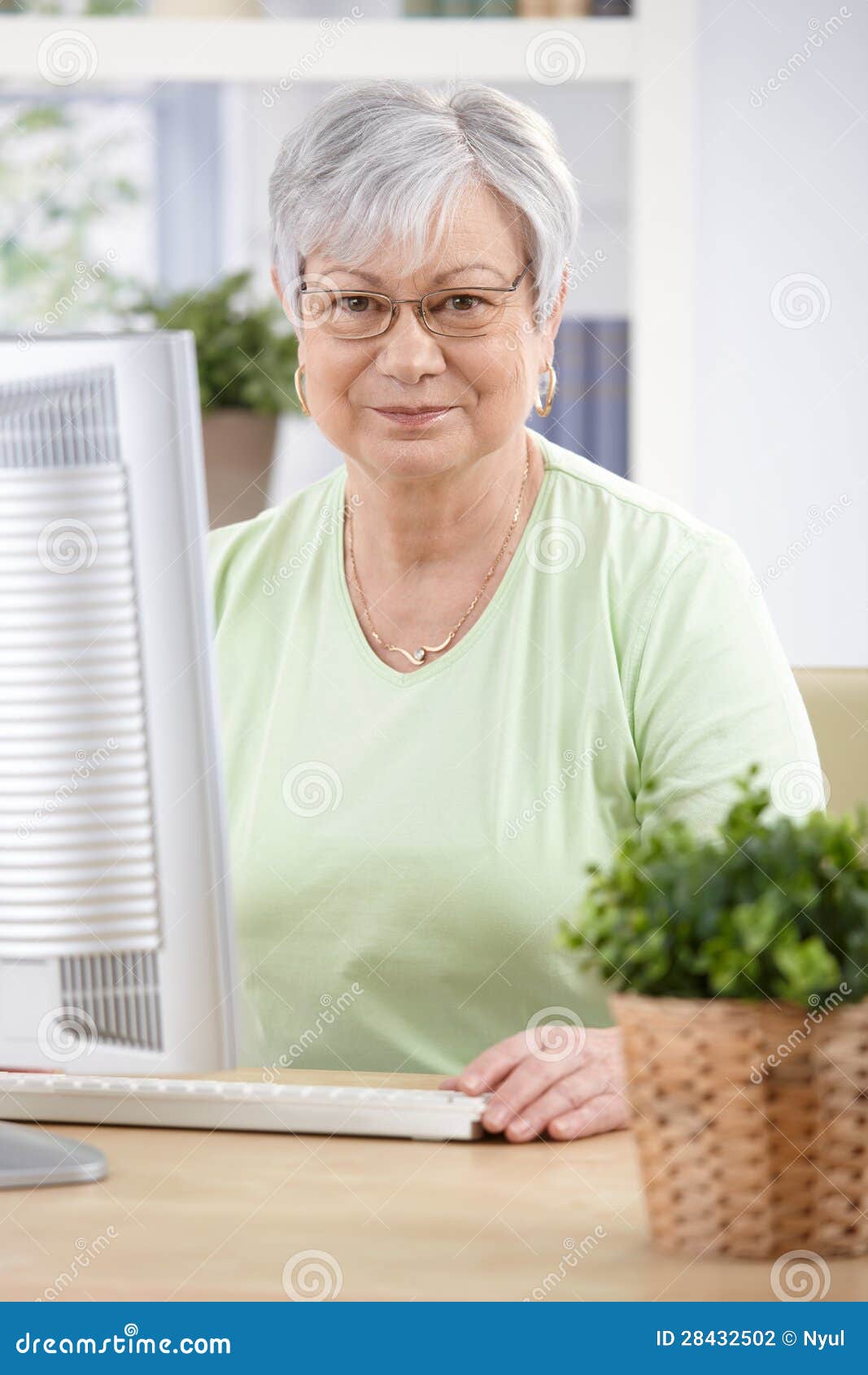 Portrait of Elderly Woman with Computer Smiling Stock Photo - Image of ...