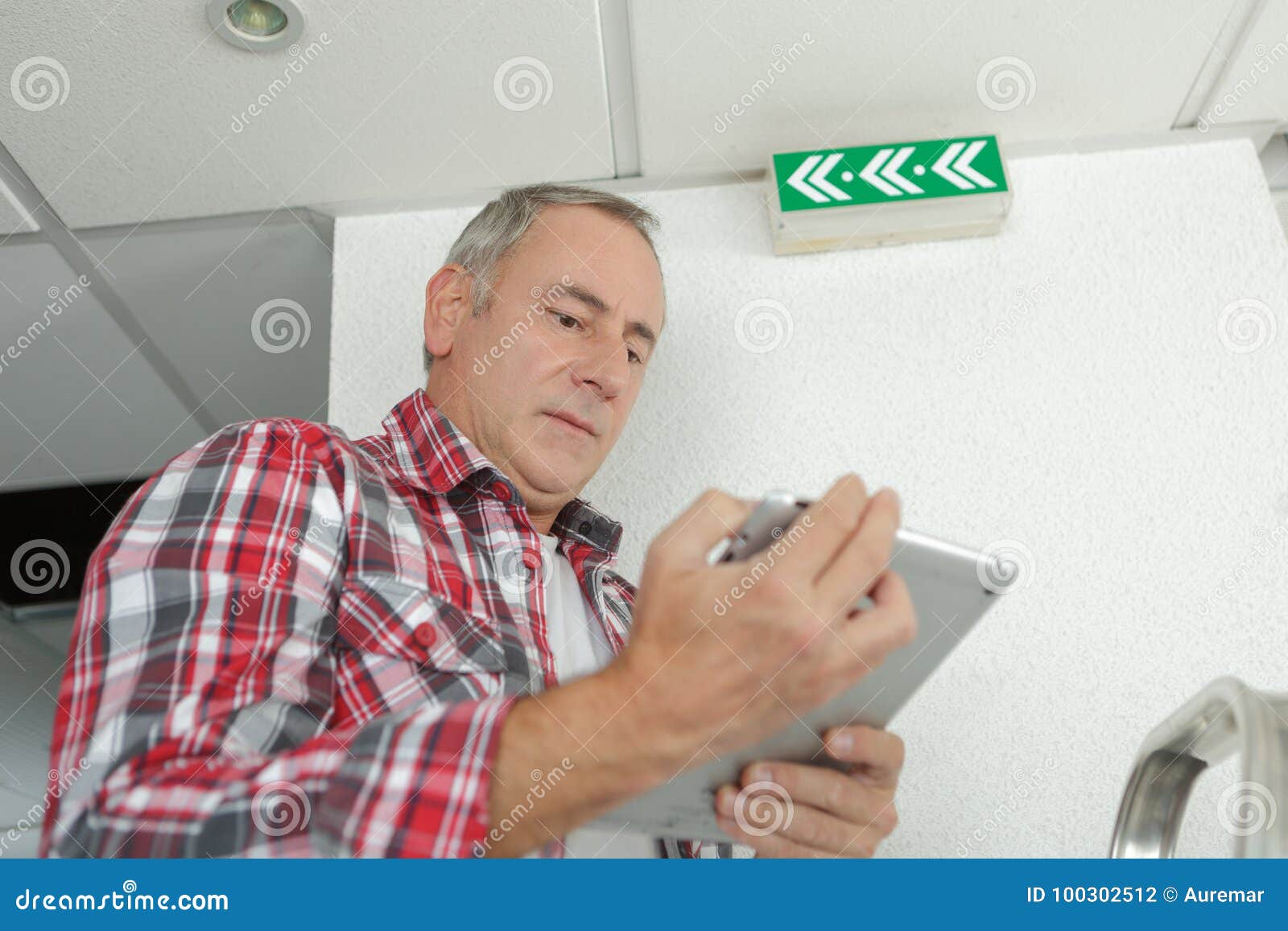 Portrait Electrician Using Tablet Computer Stock Photo - Image of ...