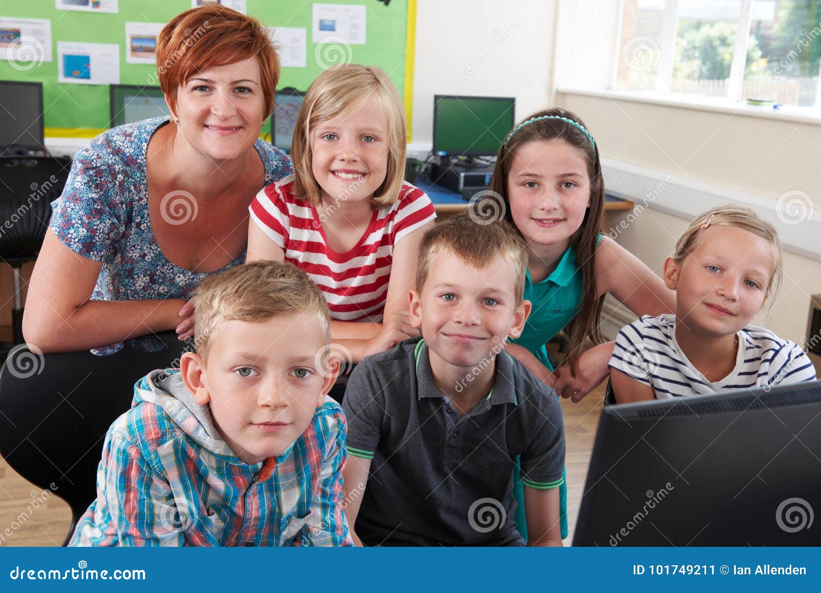 Portrait of Elementary Pupils in Computer Class with Teacher Stock ...