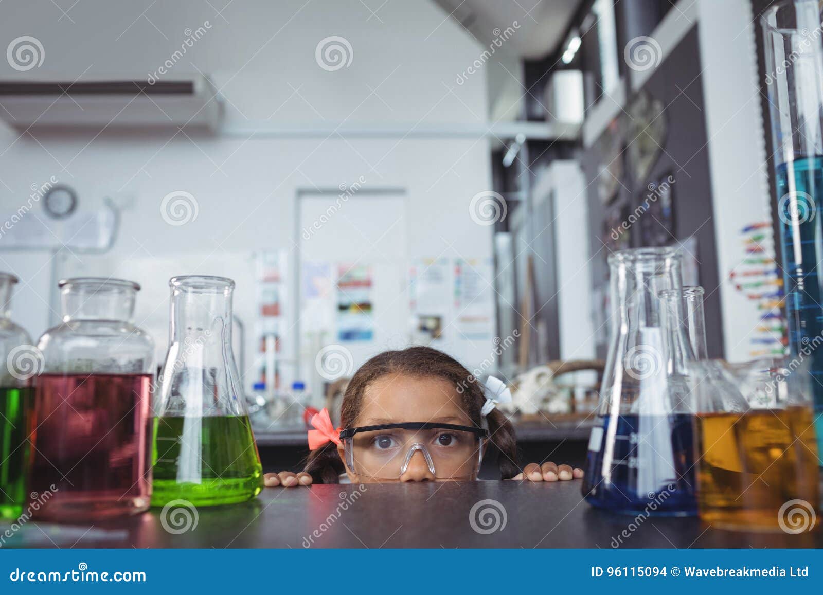 Portrait of Elementary Student Hiding in Laboratory Stock Photo - Image ...