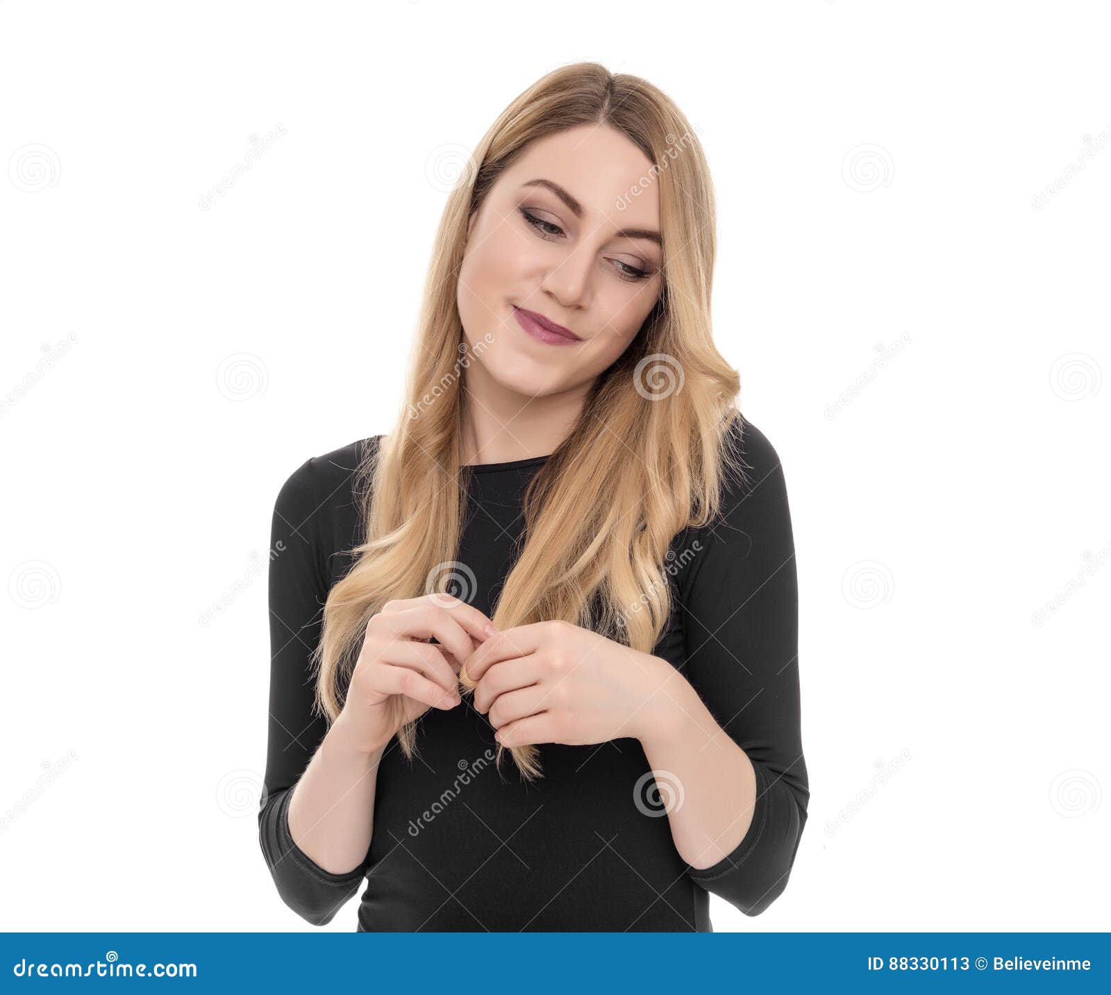 Portrait Of Embarrassed Young Woman Looking At Camera. Studio Shot ...