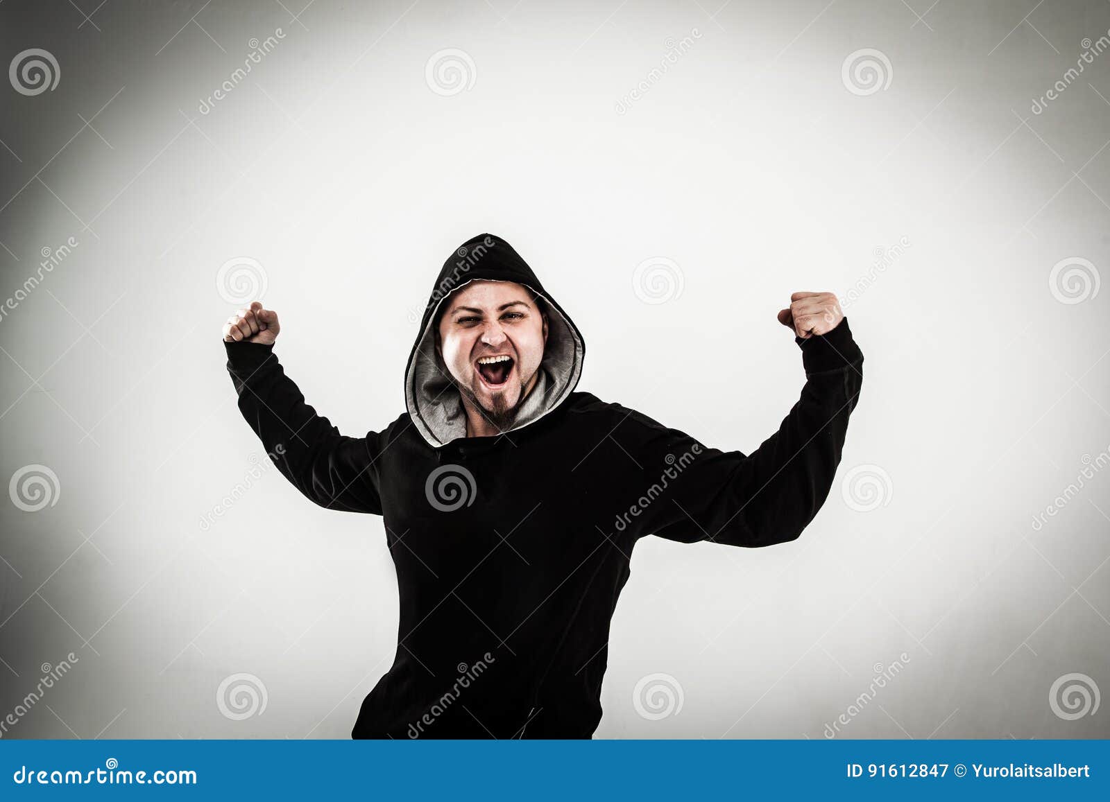 Portrait of a Energetic Guy Rapper on a Light Background Stock Image ...
