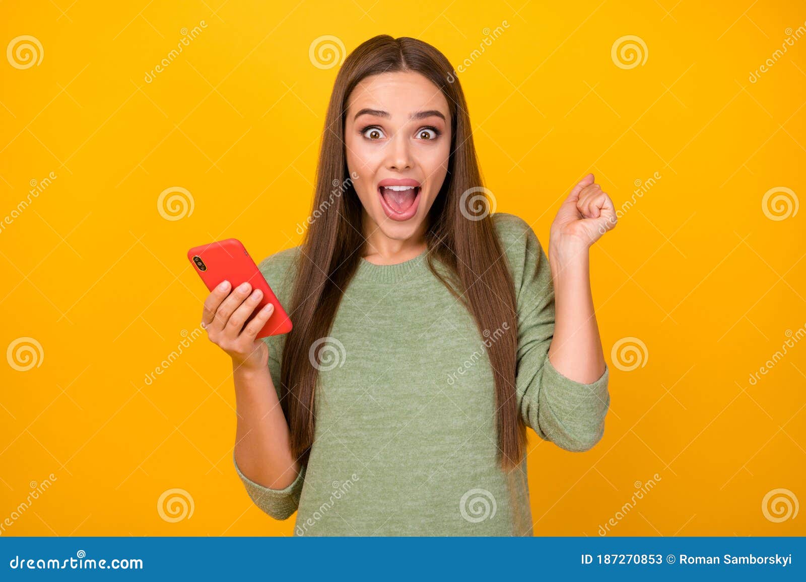 Portrait Of Energetic Positive Cheerful Girl Use Smartphone Blogging