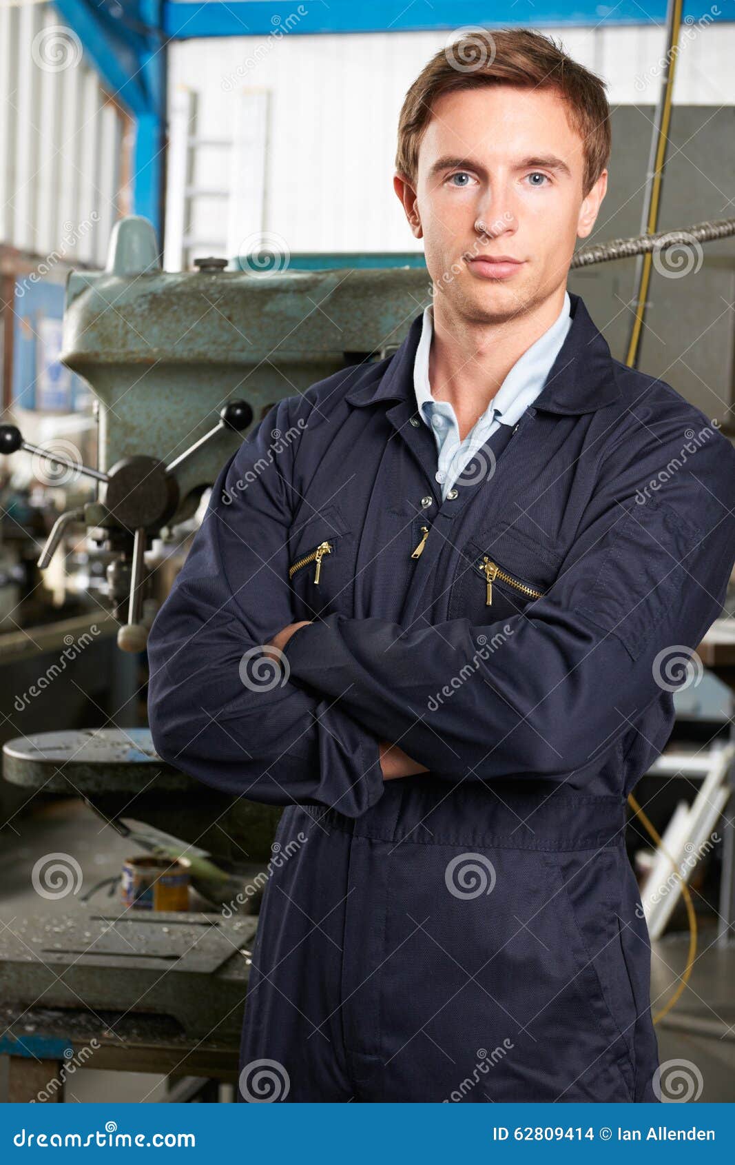 Portrait of Engineer on Factory Floor Stock Photo - Image of smiling ...