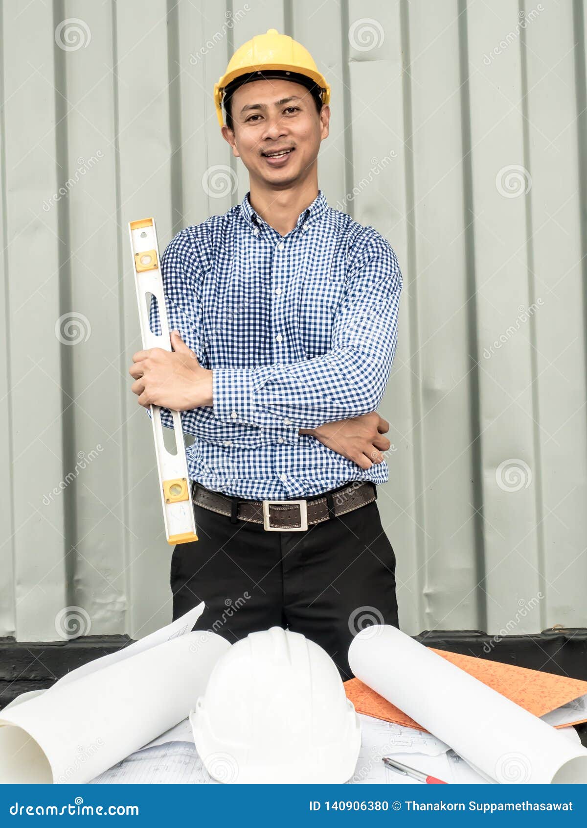 Portrait of an Engineer Man Holding Level Measuring Instrument and ...