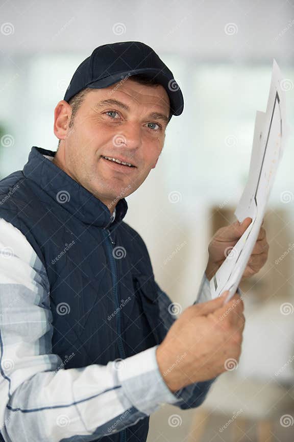Portrait Engineer Studying Layout Plan on Office Stock Photo - Image of ...