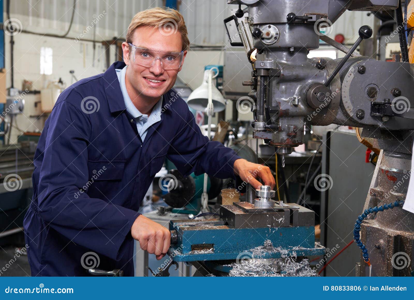 Portrait of Engineer Using Drill in Factory Stock Photo - Image of ...