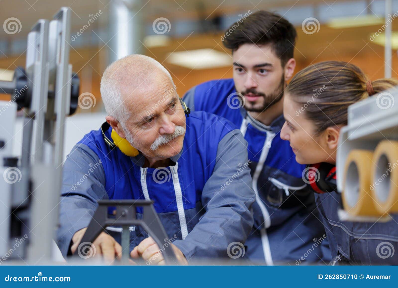 Portrait Engineers and Apprentices in Busy Factory Stock Photo - Image ...