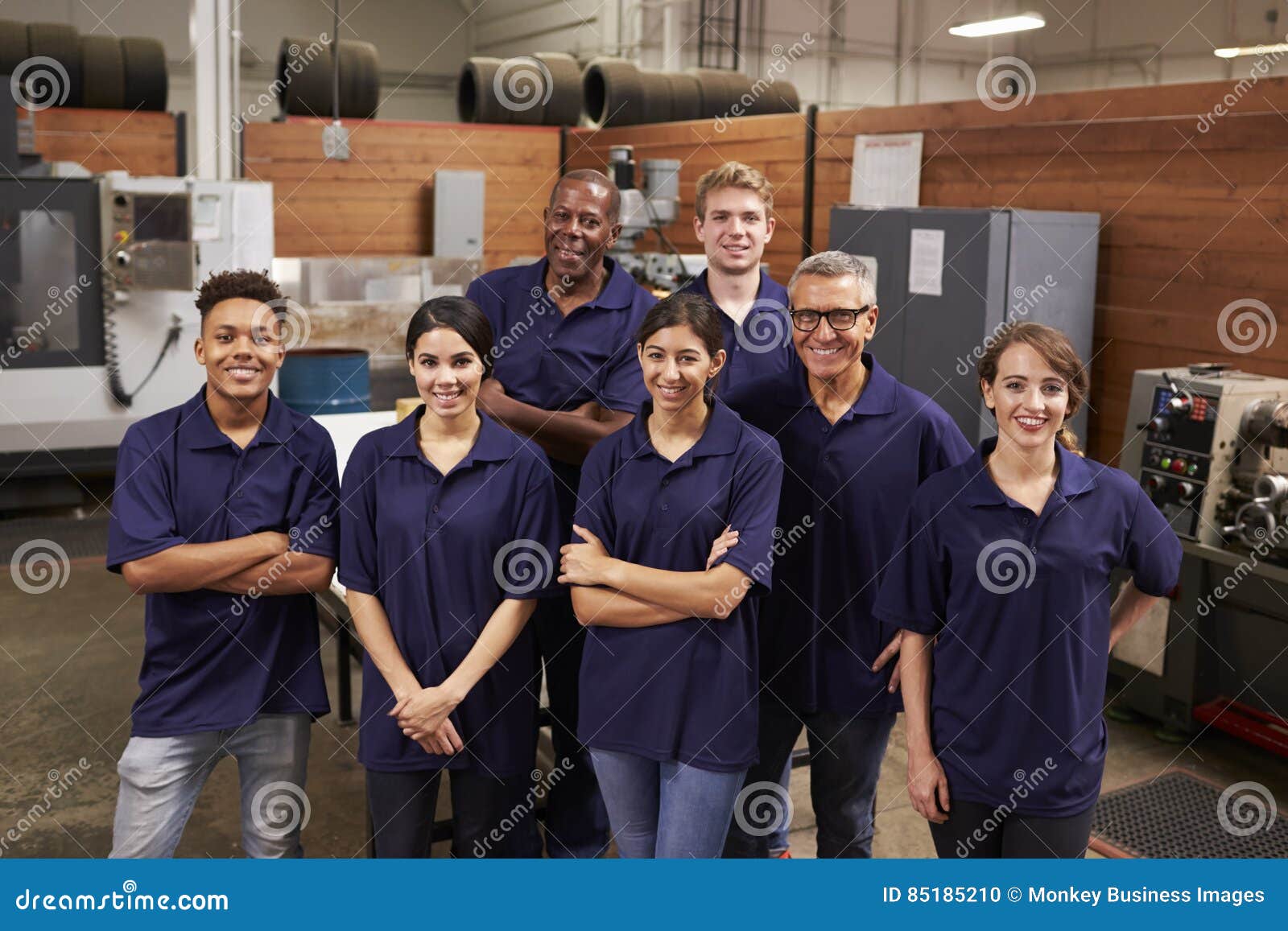 Portrait of Engineers and Apprentices in Busy Factory Stock Photo ...