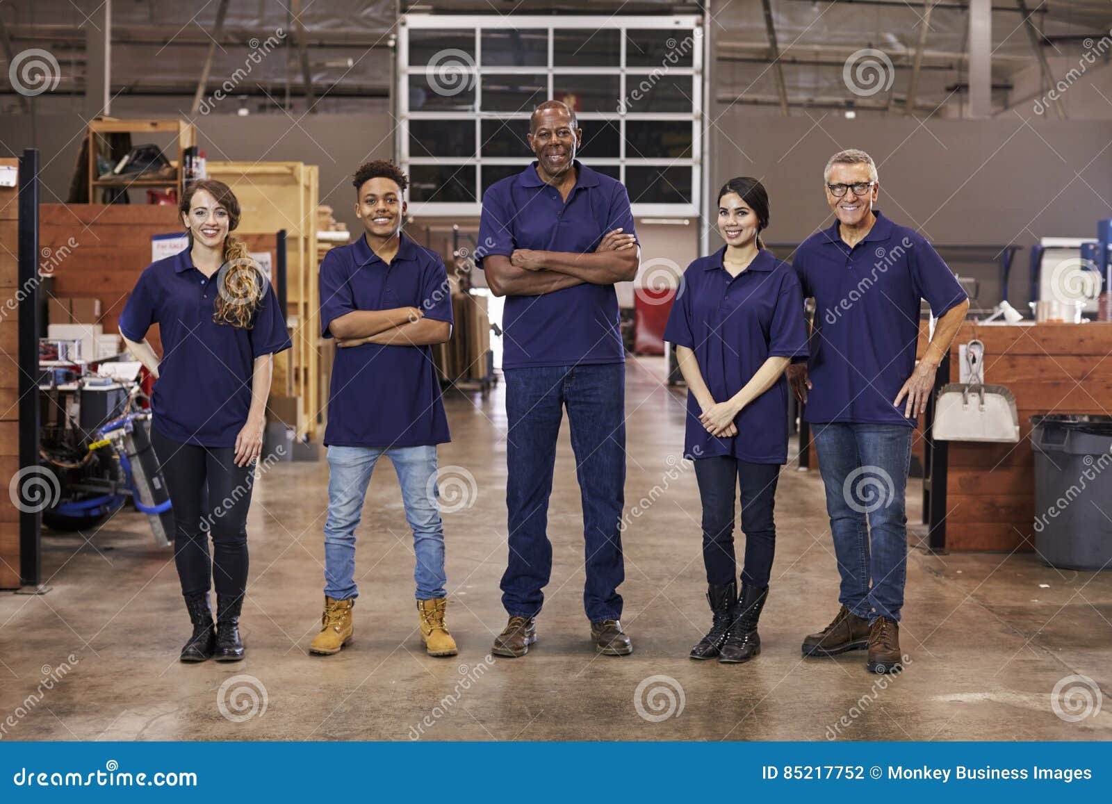 Portrait of Engineers and Apprentices in Busy Factory Stock Photo ...