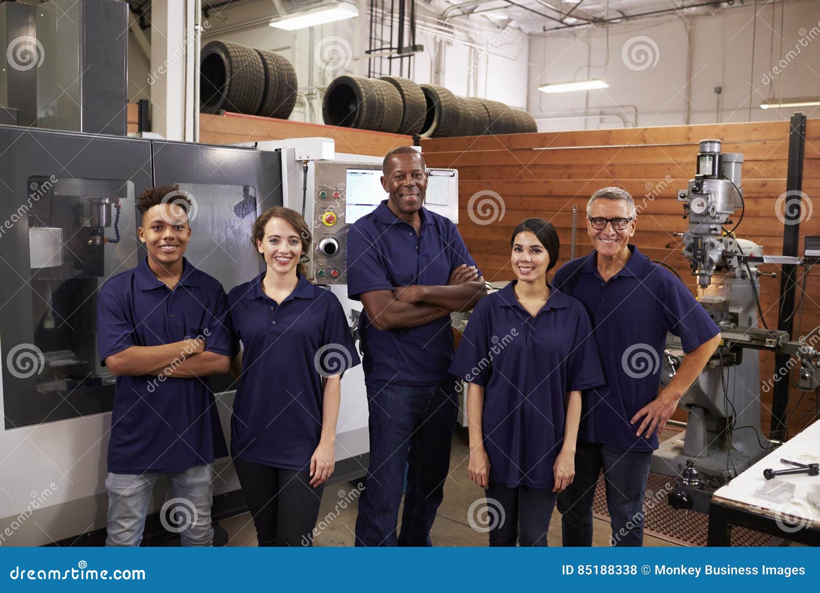 Portrait of Engineers and Apprentices with CNC Machine Stock Photo ...