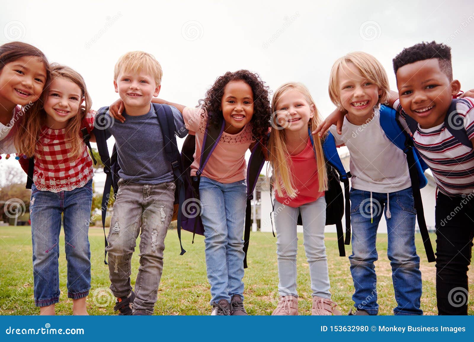Portrait of Excited Elementary School Pupils on Playing Field at Break ...