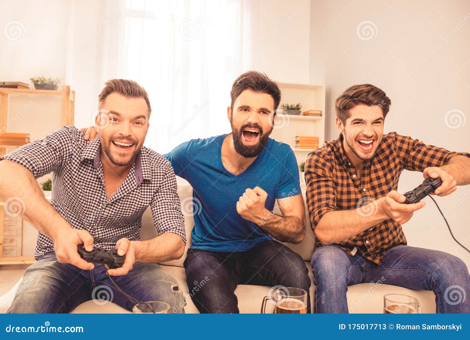 Portrait of Excited Laughing Men Playing Video Games Stock Image ...