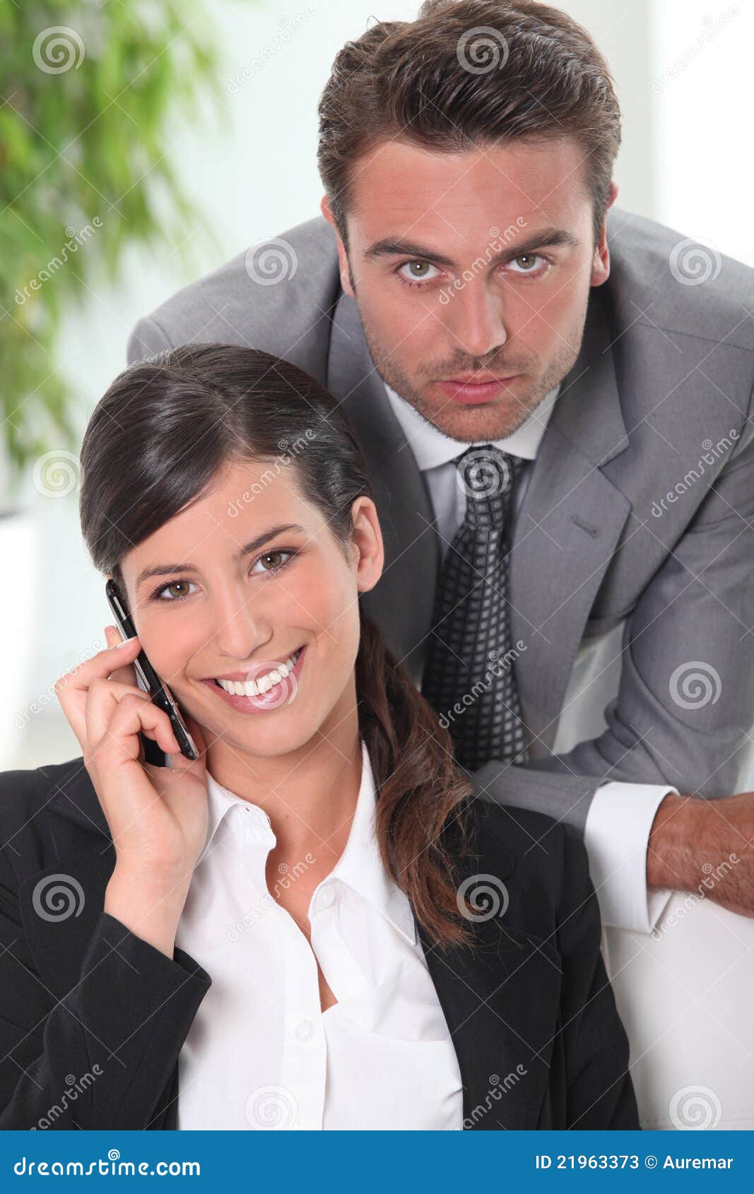 Portrait of an Executive Couple Stock Image - Image of cell, executive ...