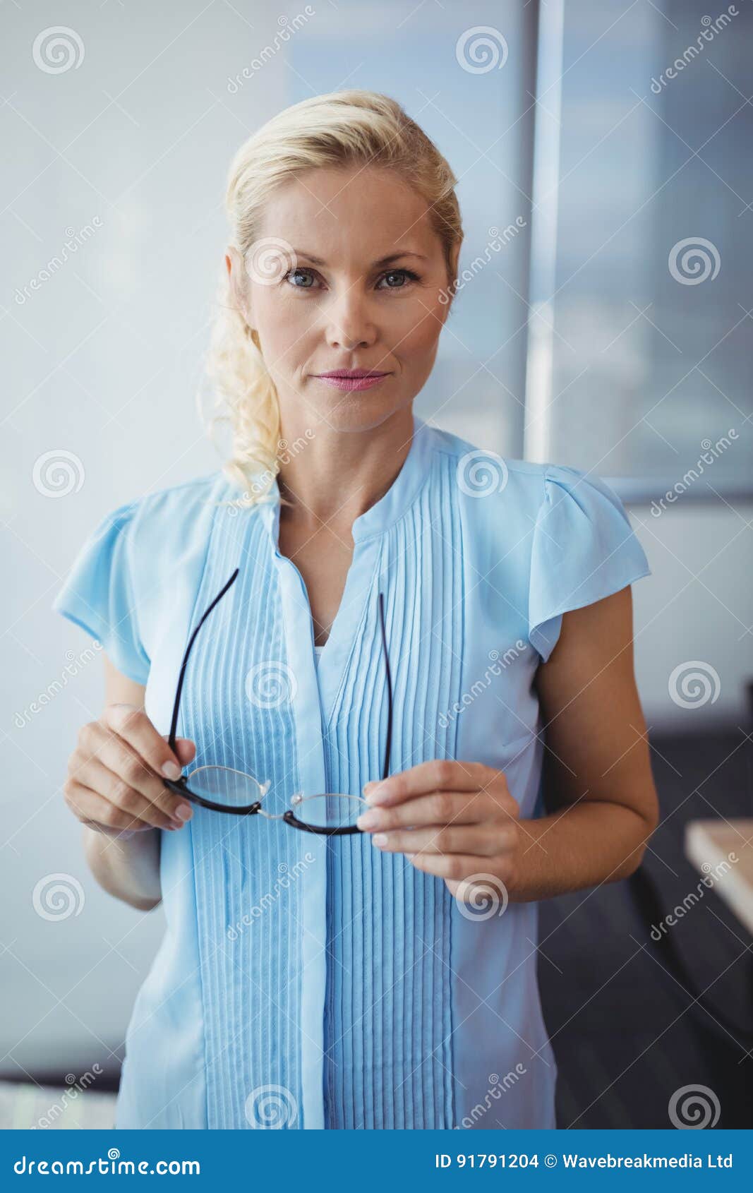 Portrait of Executive Holding Spectacles Stock Photo - Image of ...