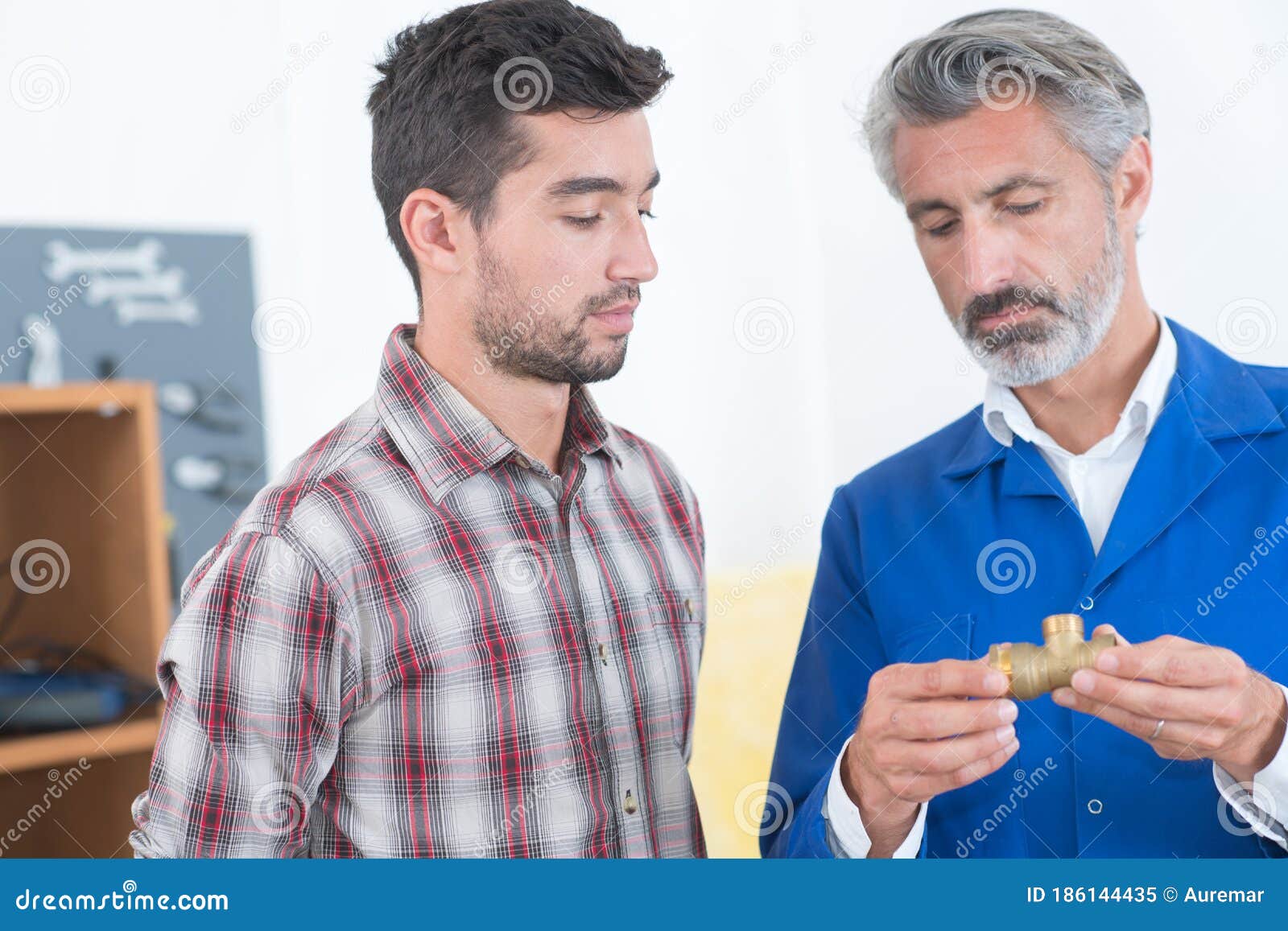 Portrait Experienced Plumber Training Apprentice Stock Image - Image of ...