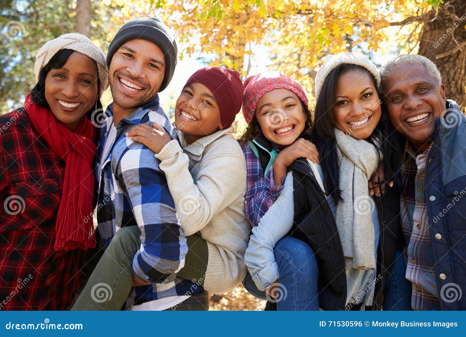 Portrait of Extended Family on Walk through Woods in Fall Stock Photo ...