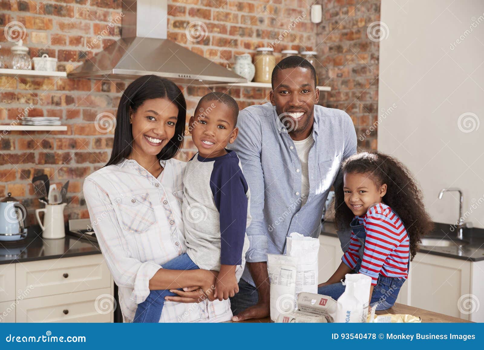 Portrait of Family Baking Cakes in Kitchen Together Stock Photo - Image ...