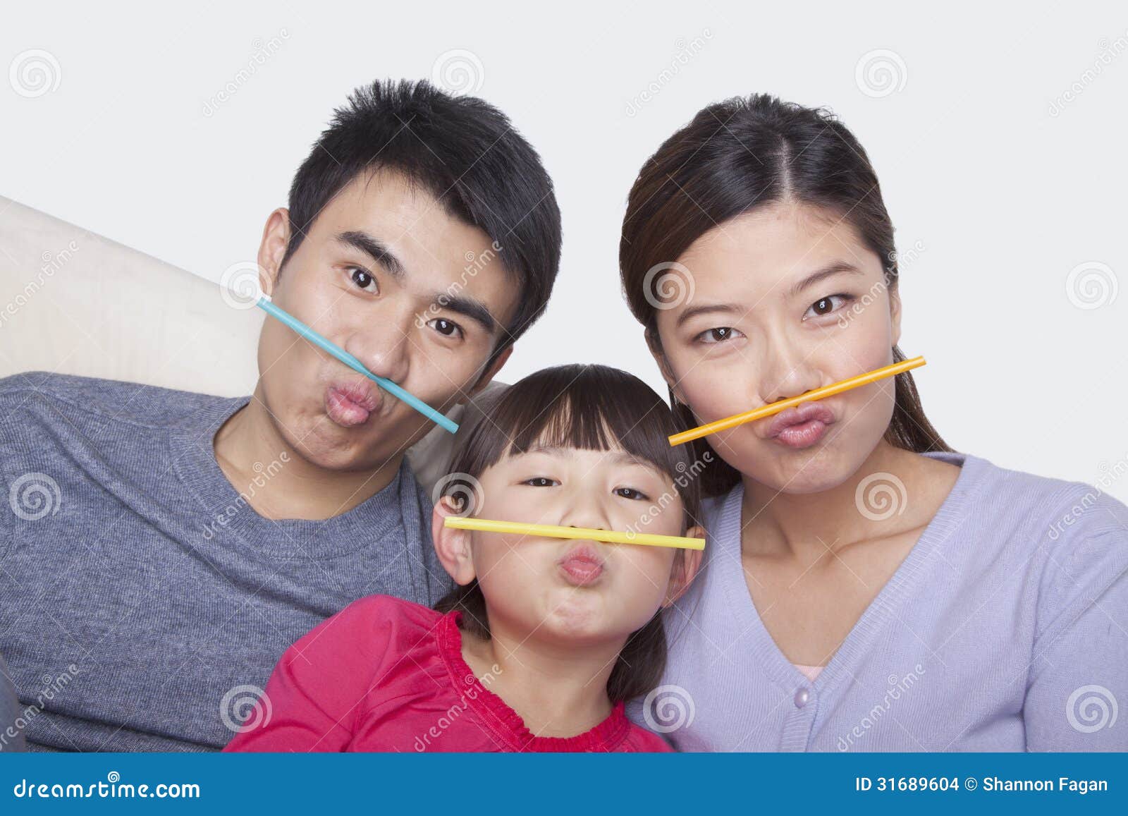 Portrait of Family Making a Face with Drinking Straws Stock Photo ...