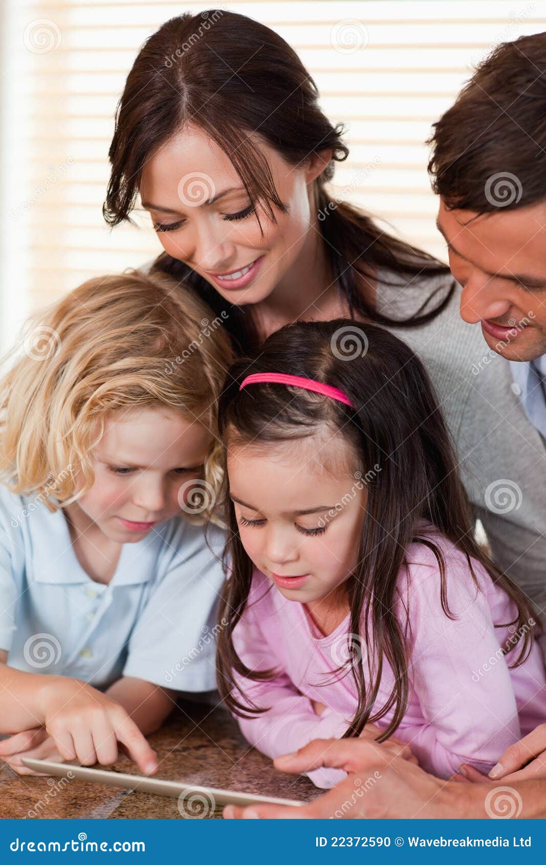 Portrait of a Family Using a Tablet Computer Together Stock Photo ...