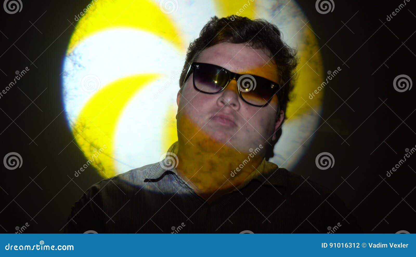 Portrait of a Fat Man in a Multicolored Light Beam. Stock Footage ...