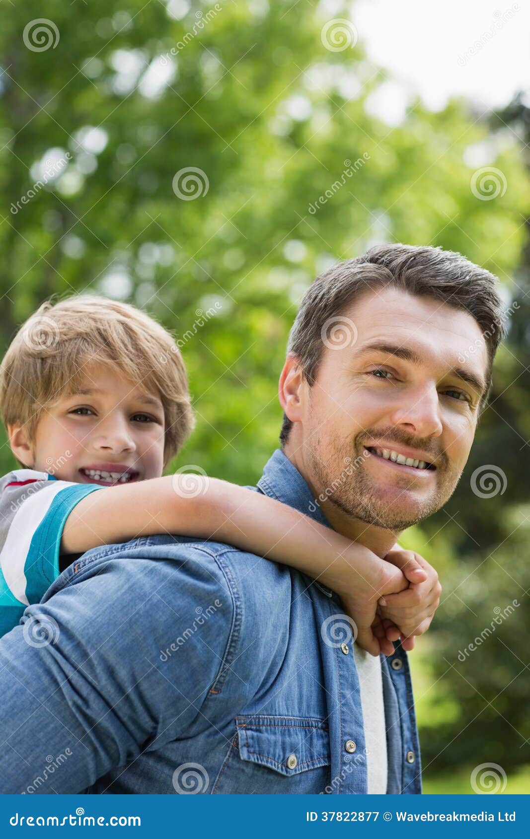 Portrait of a Father Carrying Young Boy on Back Stock Image - Image of ...