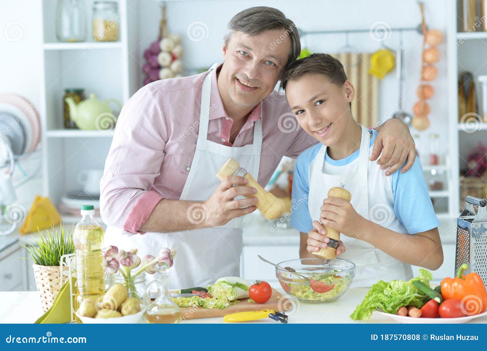 Portrait of Father and Son Cooking Breakfast in the Kitchen Stock Photo ...