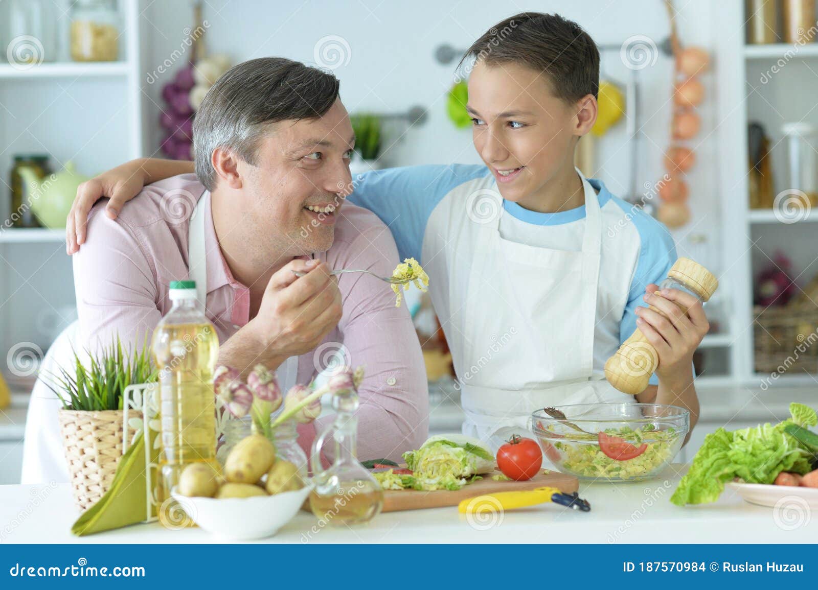 Portrait of Father and Son Cooking Breakfast in the Kitchen Stock Photo ...