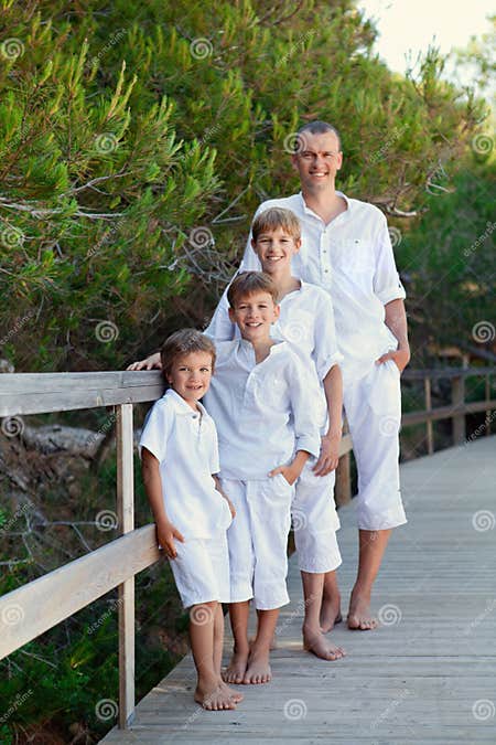 Portrait of Father and Three Sons Stock Photo - Image of group, adult ... Portrait of Father and Three Sons Stock Photo - Image of group, adult ...