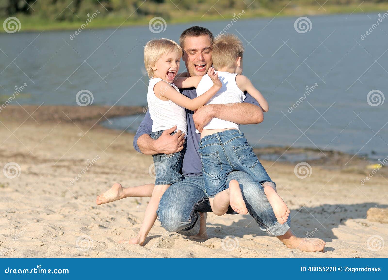 Portrait of a Father and Two Sons Stock Photo - Image of parents ...