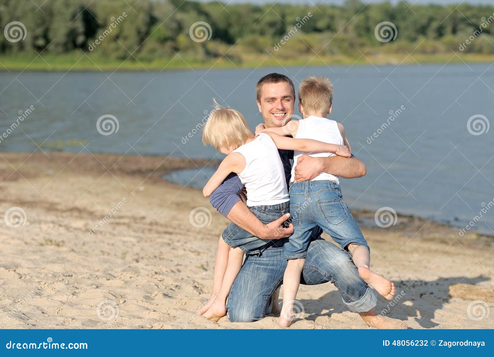 Portrait of a Father and Two Sons Stock Photo - Image of smiling, child ...