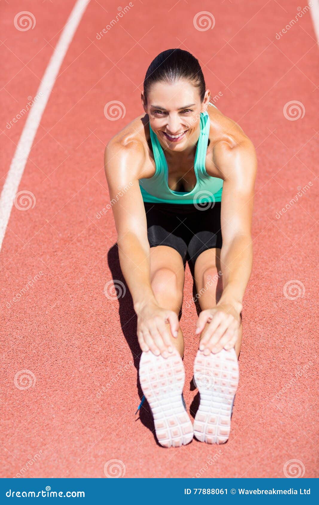 Portrait of Female Athlete Doing Stretching Exercise Stock Image ...